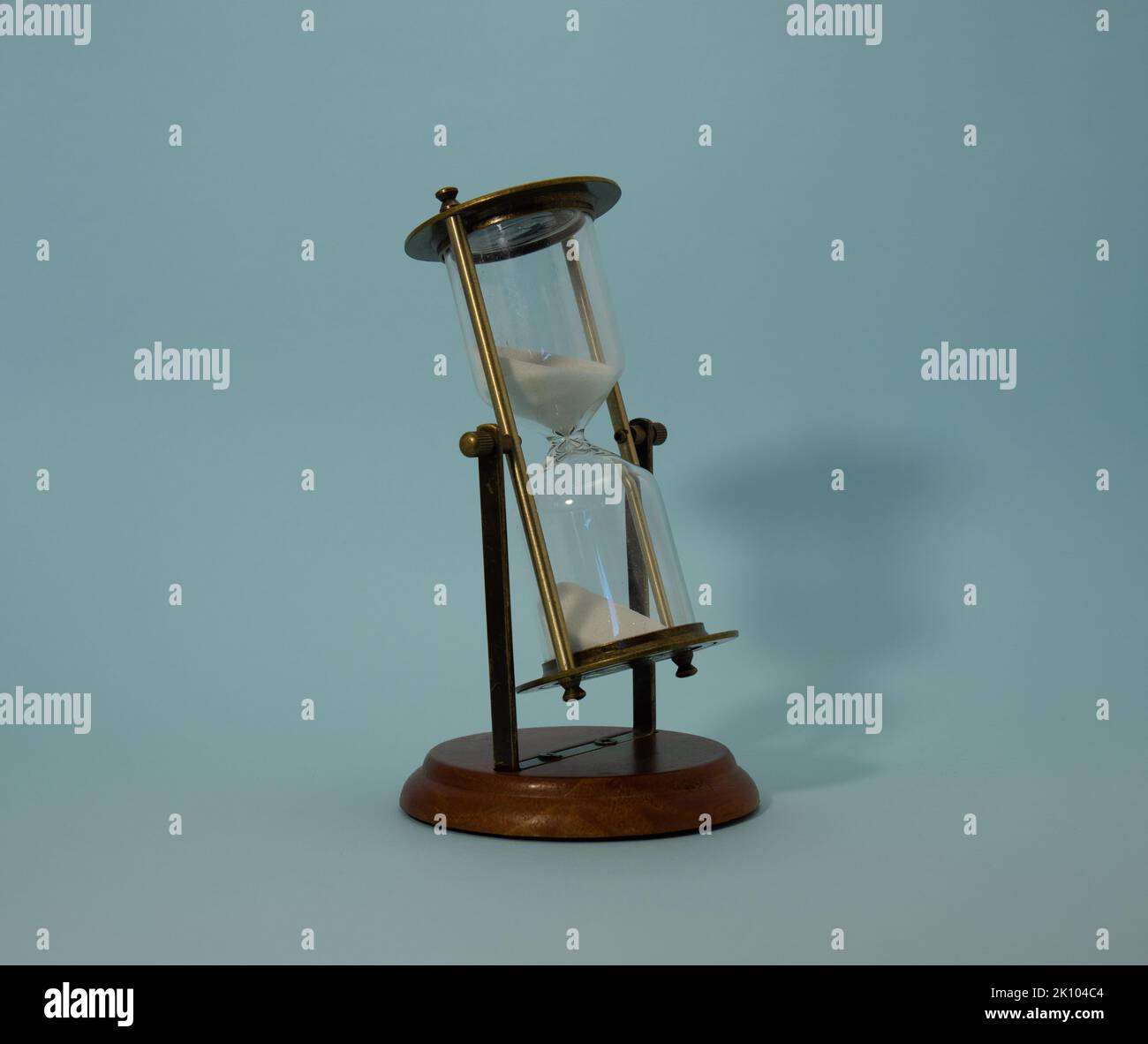 tilted retro hourglass composition on celestial background Stock Photo ...