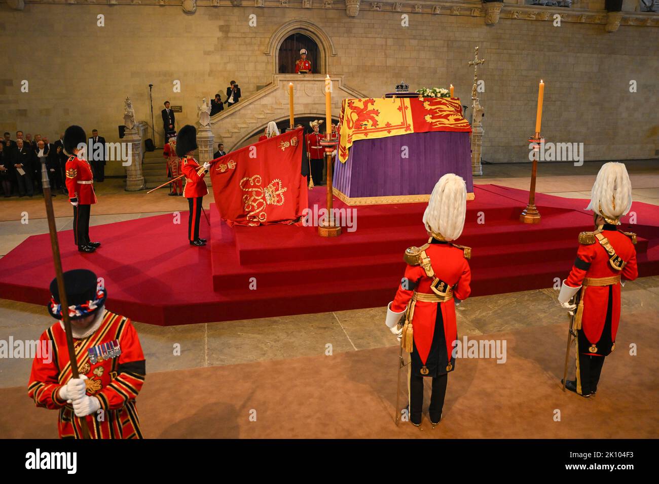 The coffin of Queen Elizabeth II, draped in the Royal Standard with the ...