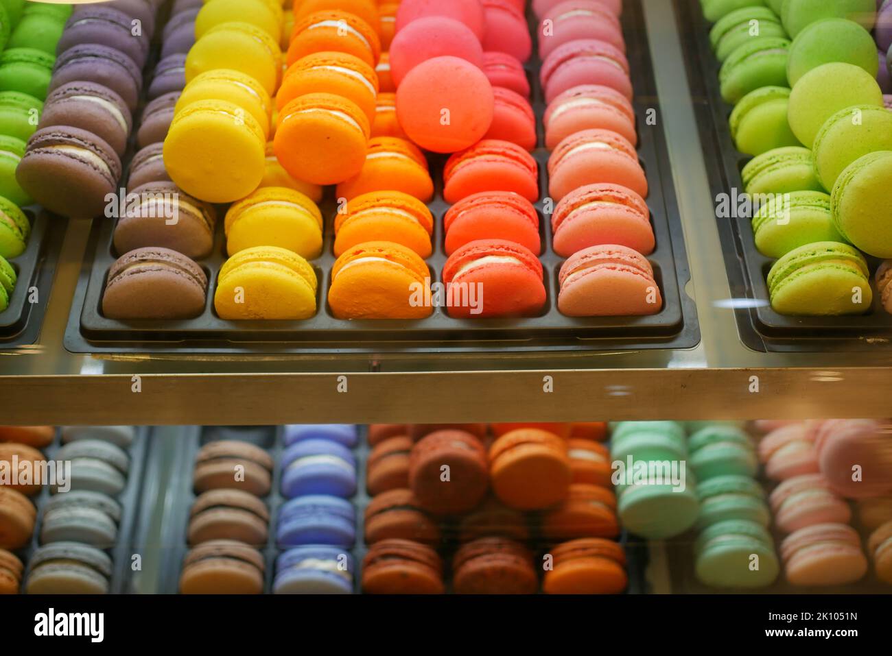 displaying colorful macaroon on shelf Stock Photo - Alamy