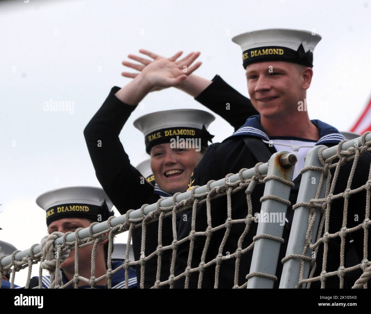 SAILORS WAVE TO LOVED ONES FROM THE DECK AS HMS DIAMOND RETURNED TO ...