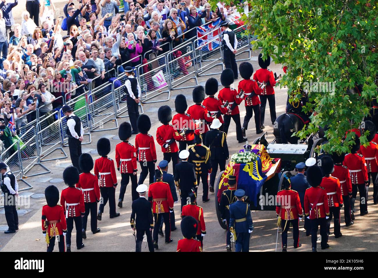 The coffin of Queen Elizabeth II, draped in the Royal Standard with the ...