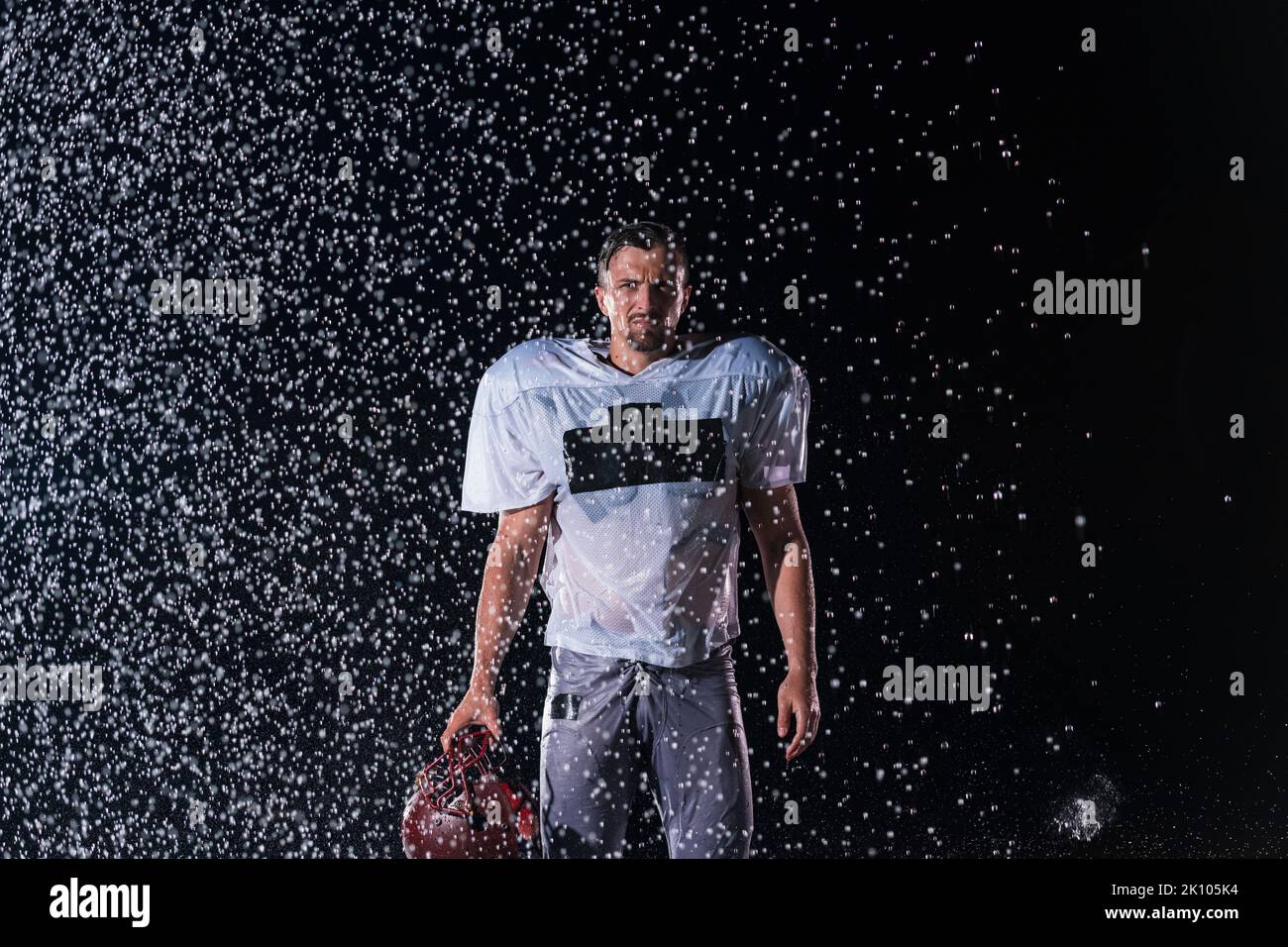 American Football Field: Lonely Athlete Warrior Standing on a Field ...