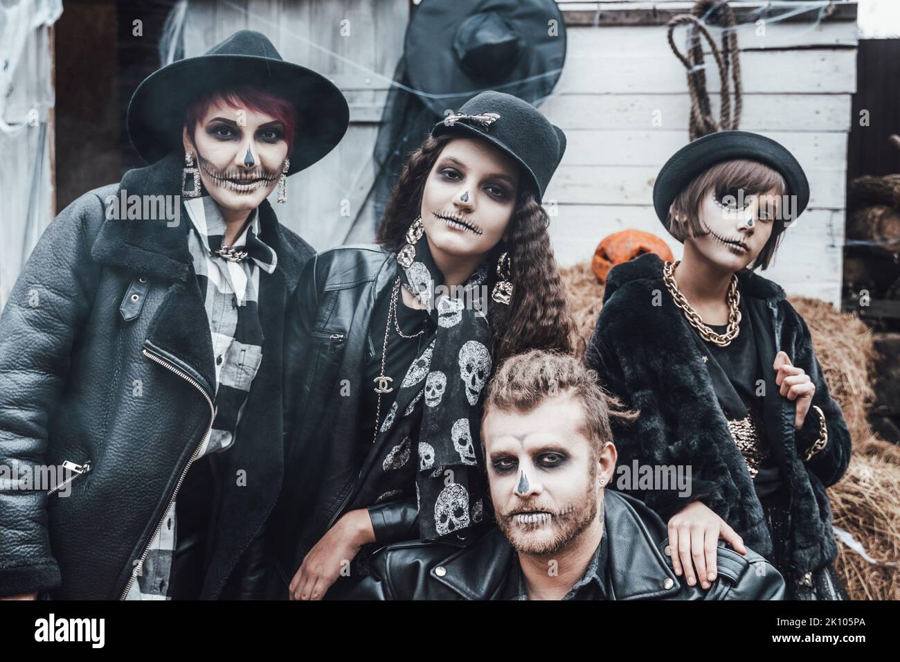 Scary family, mother, father, daughters celebrating halloween ...