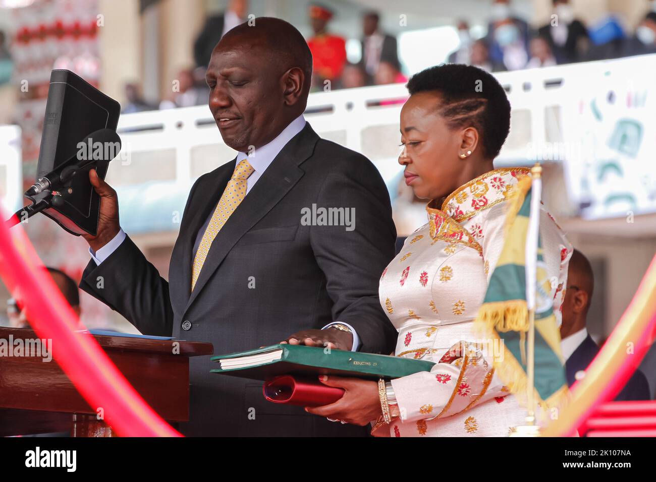 Nairobi, Kenya. 13th Sep, 2022. Dr. William Ruto (L) assisted by his wife Racheal Ruto (R) takes ...