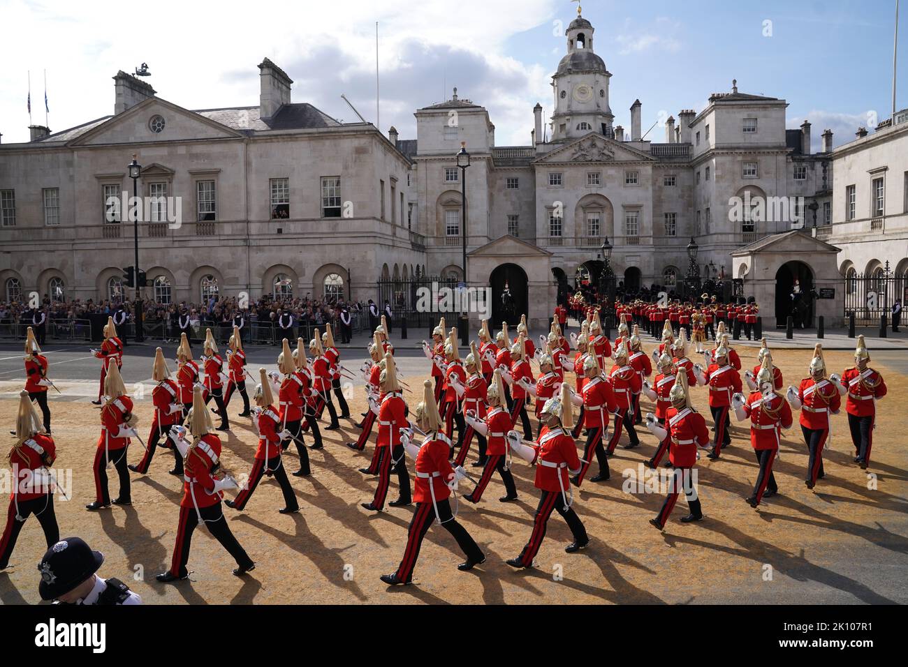 Royal guards march during the ceremonial procession from Buckingham ...