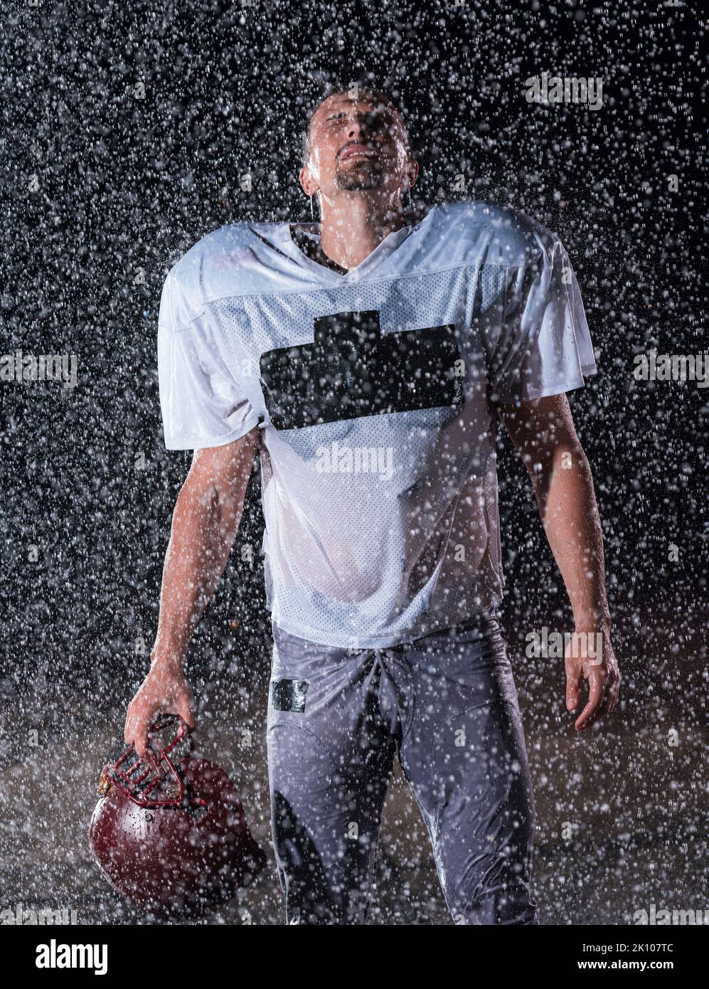 American Football Field: Lonely Athlete Warrior Standing on a Field ...