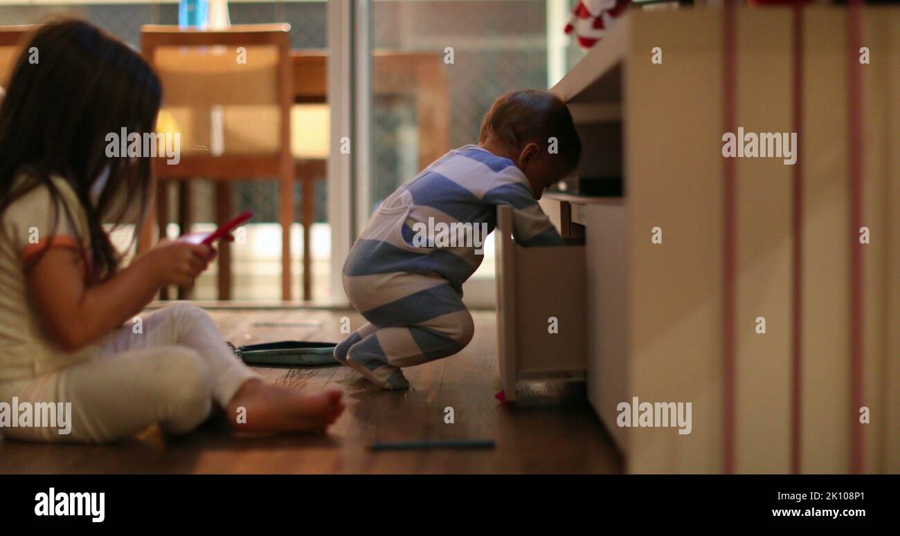 Kids at home in evening, Children before bed staring at smartphone ...