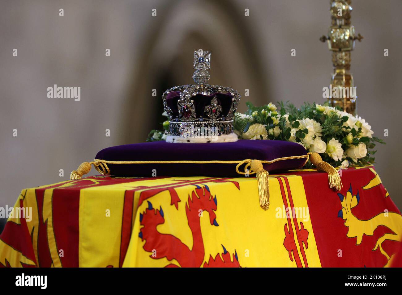 The coffin of Queen Elizabeth II, draped in the Royal Standard with the ...