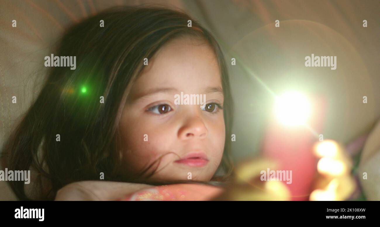 Little girl child using smartphone device, kid playing with cellphone ...