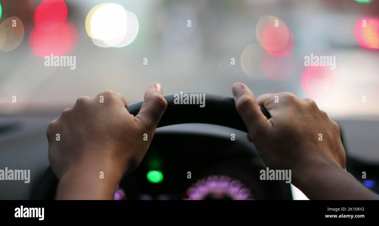 Closeup hand holding car steering hi-res stock photography and images ...