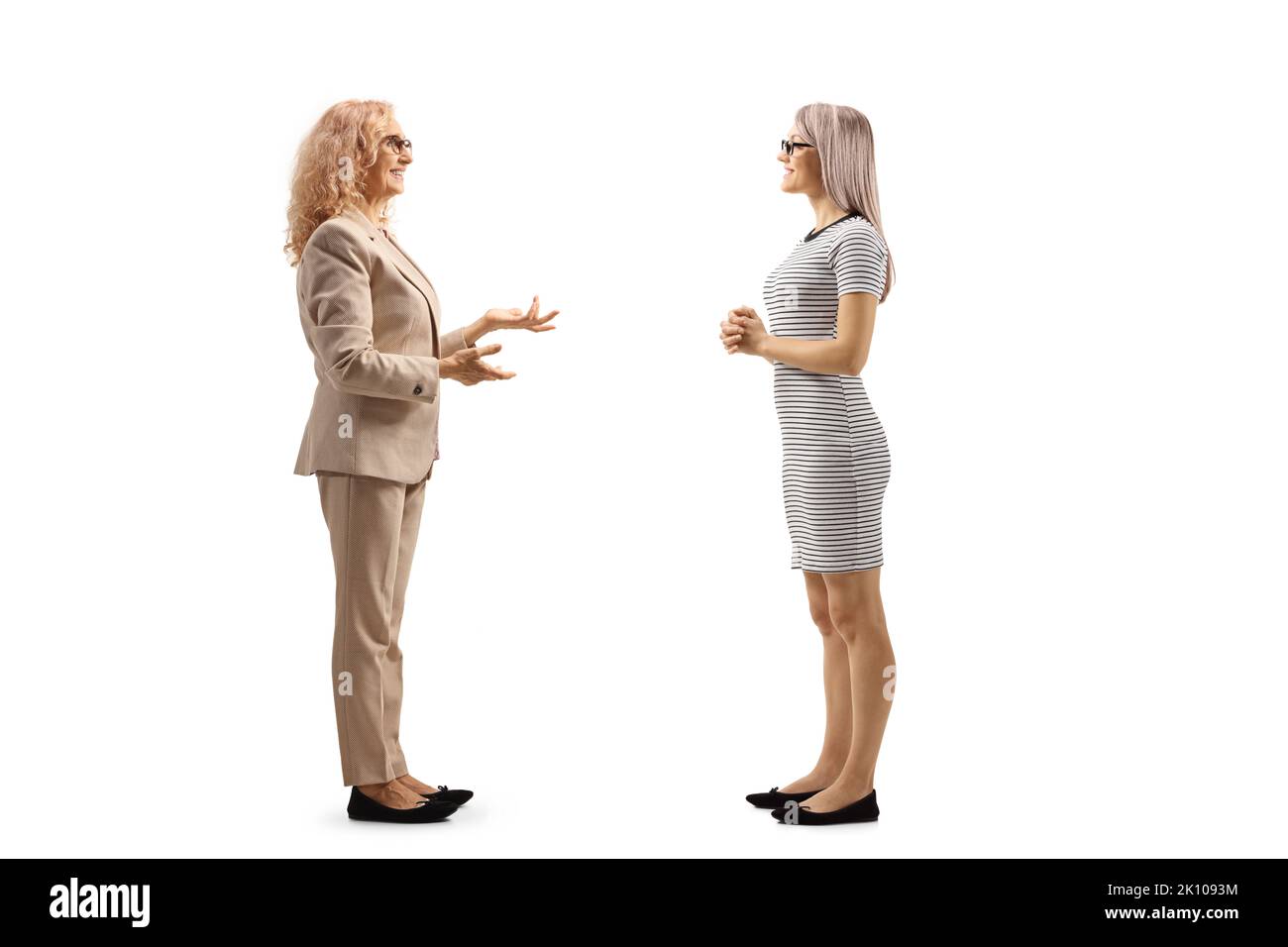 Conversation between two women isolated on white background Stock Photo ...