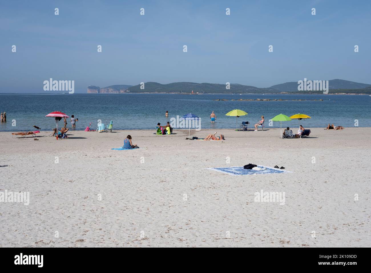View of the Spiaggia del Lido di Alghero beach near the old town of ...