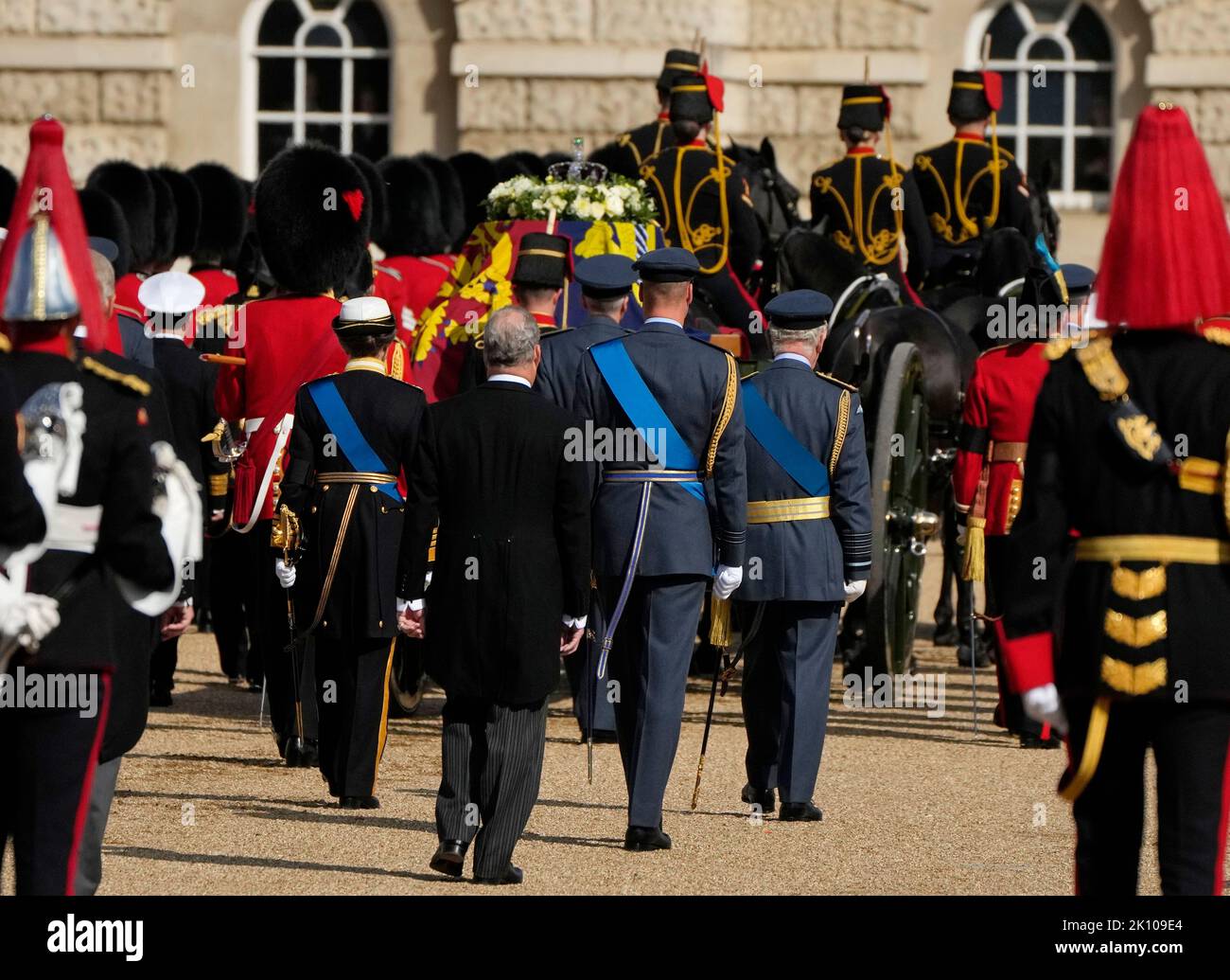 The coffin of Queen Elizabeth II, draped in the Royal Standard, is ...