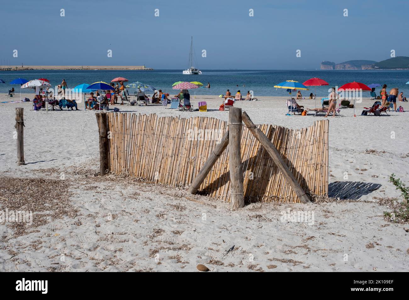 View of the Spiaggia del Lido di Alghero beach near the old town of ...