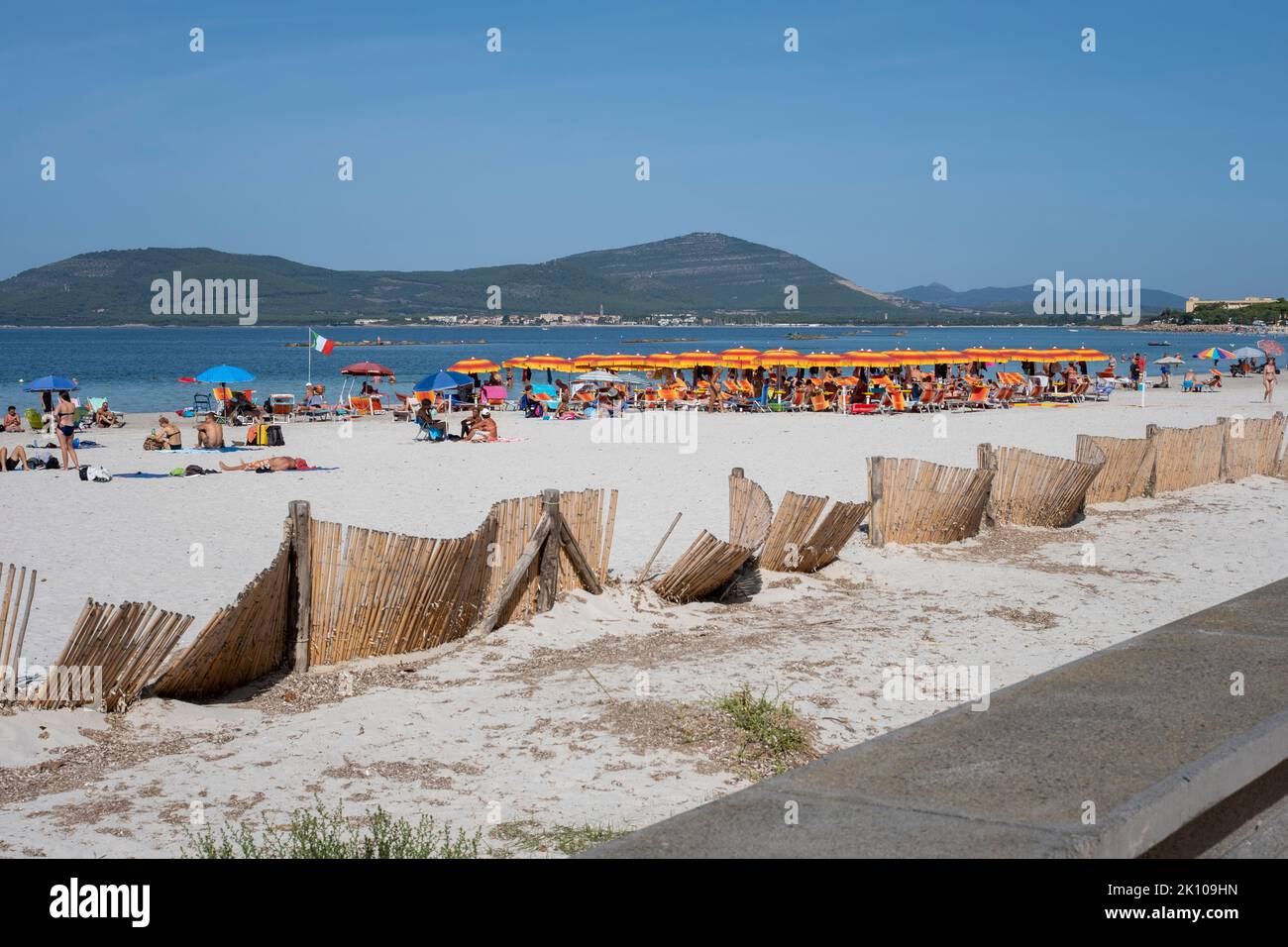 View of the Spiaggia del Lido di Alghero beach near the old town of ...
