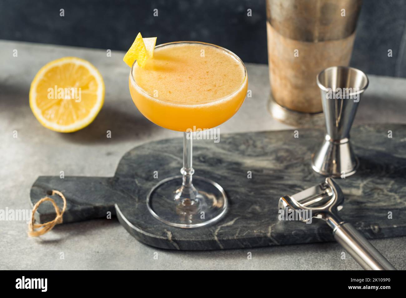 Boozy Refreshing Applejack Rabbit Cocktail with Lemon and Orange Stock ...