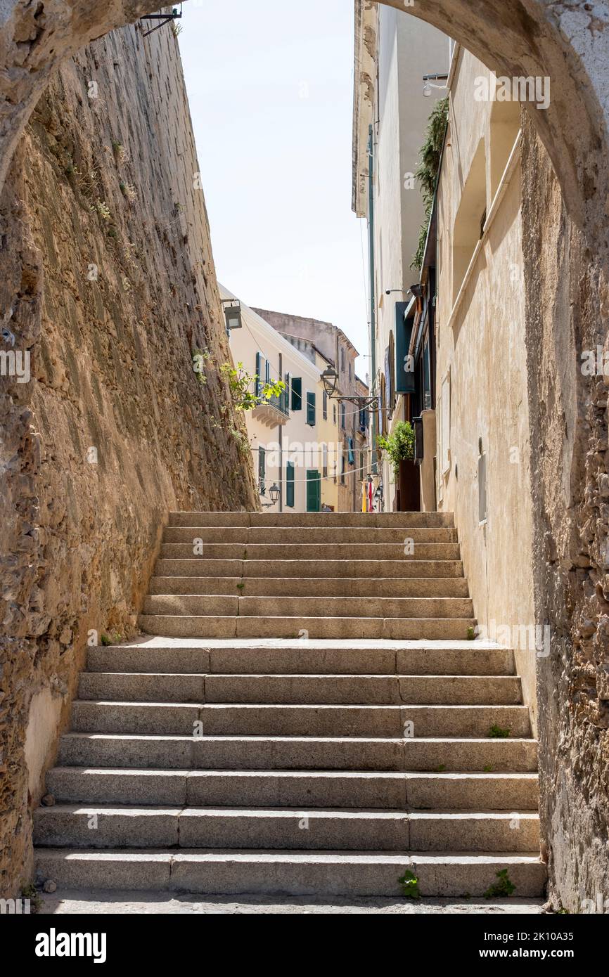 View of the old town centre of Alghero, Sardinia, Italy through an ...