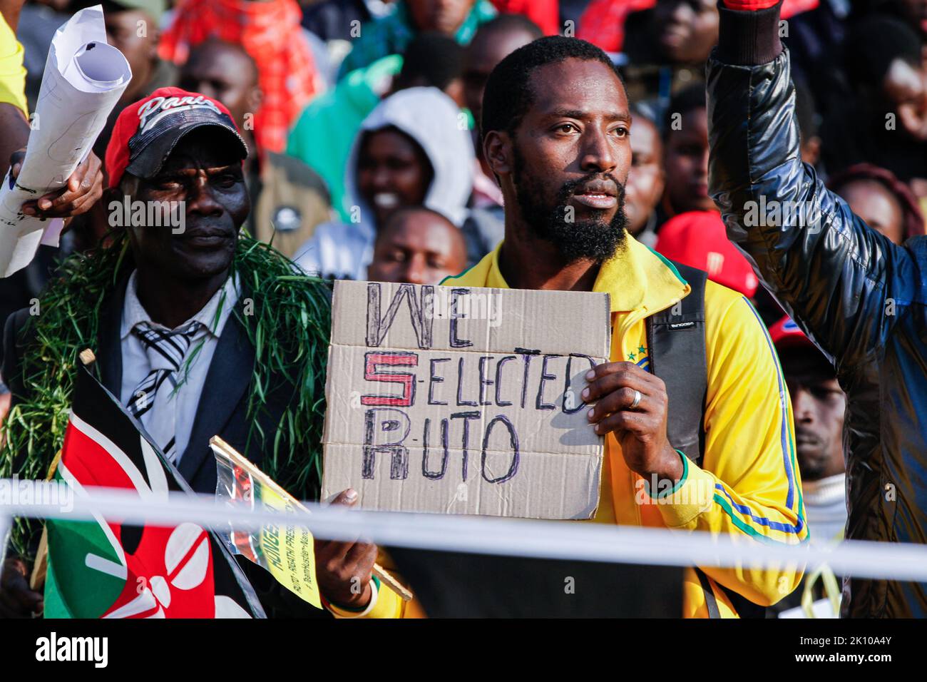 Nairobi, Kenya. 13th Sep, 2022. A Kenyan man displays a placard at the Moi International Sports ...
