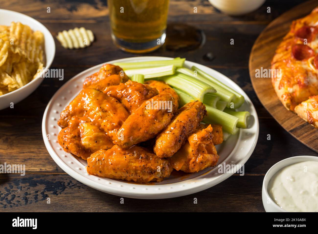 Homemade Pepperoni Pizza Chicken Wings and Beer for a Football Party ...