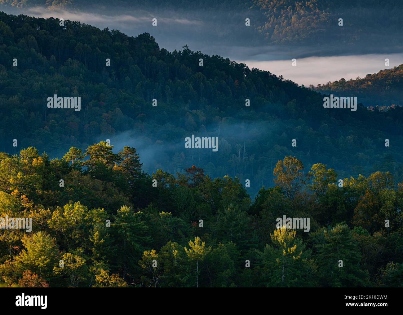 A sun lit ridge is shown from Foothills Parkway, Great Smoky Mountains ...
