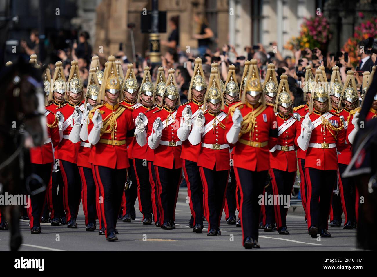Guards march during the procession as the coffin of Queen Elizabeth II ...