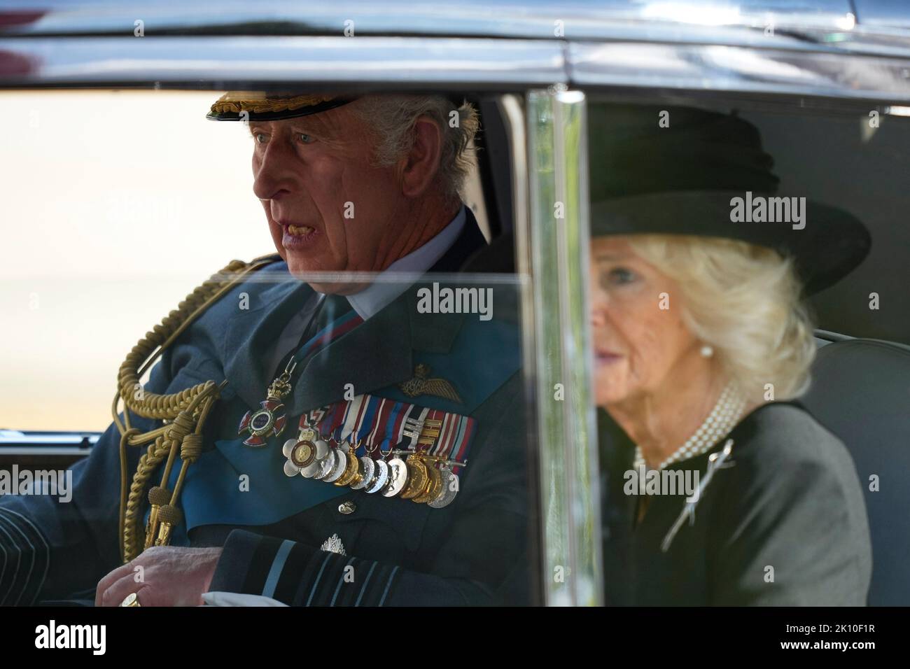 King Charles III and the Queen Consort after the coffin of Queen ...