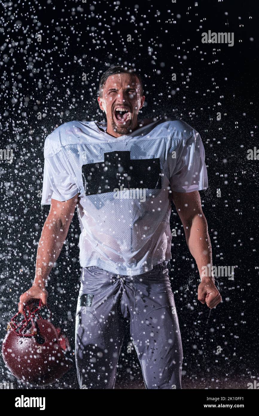 American Football Field: Lonely Athlete Warrior Standing on a Field ...