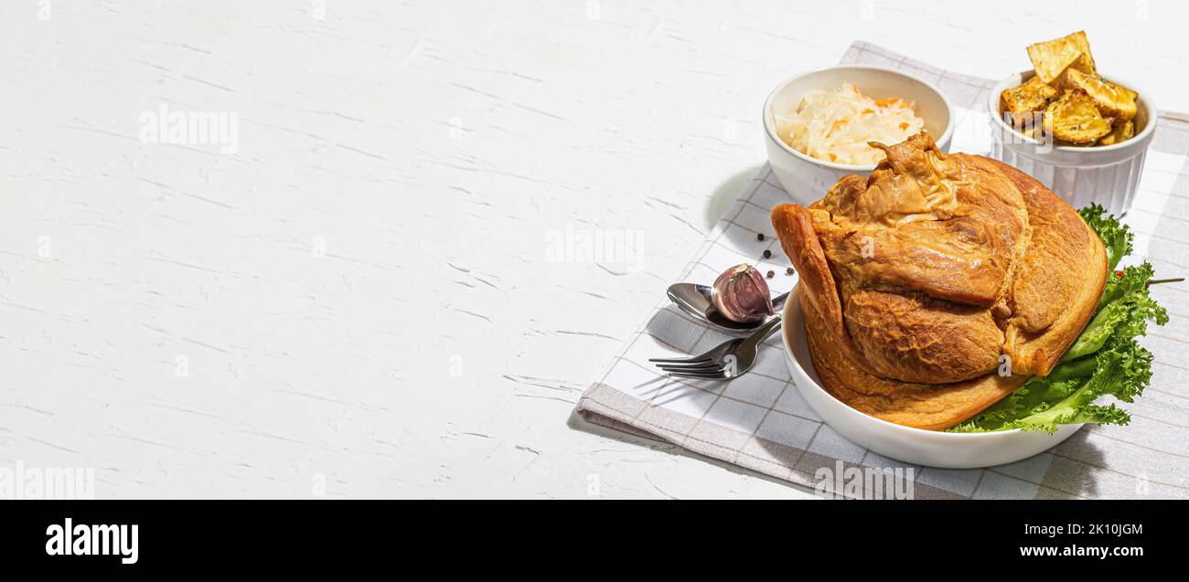 Traditional Oktoberfest smoked pork knuckle eisbein, fermented sour ...