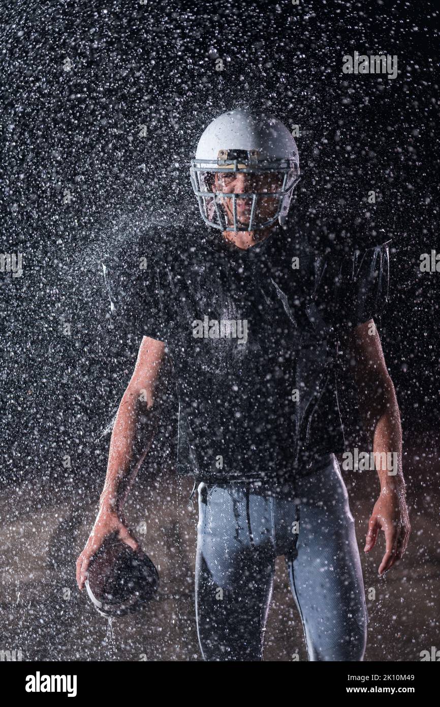 American Football Field: Lonely Athlete Warrior Standing on a Field ...