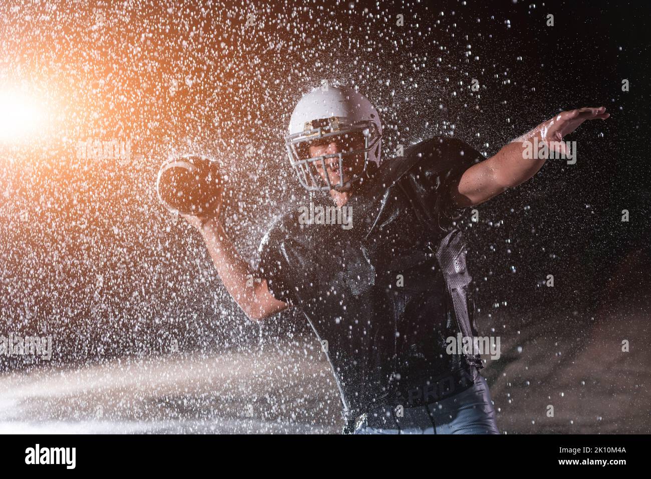 American Football Field: Lonely Athlete Warrior Standing on a Field ...