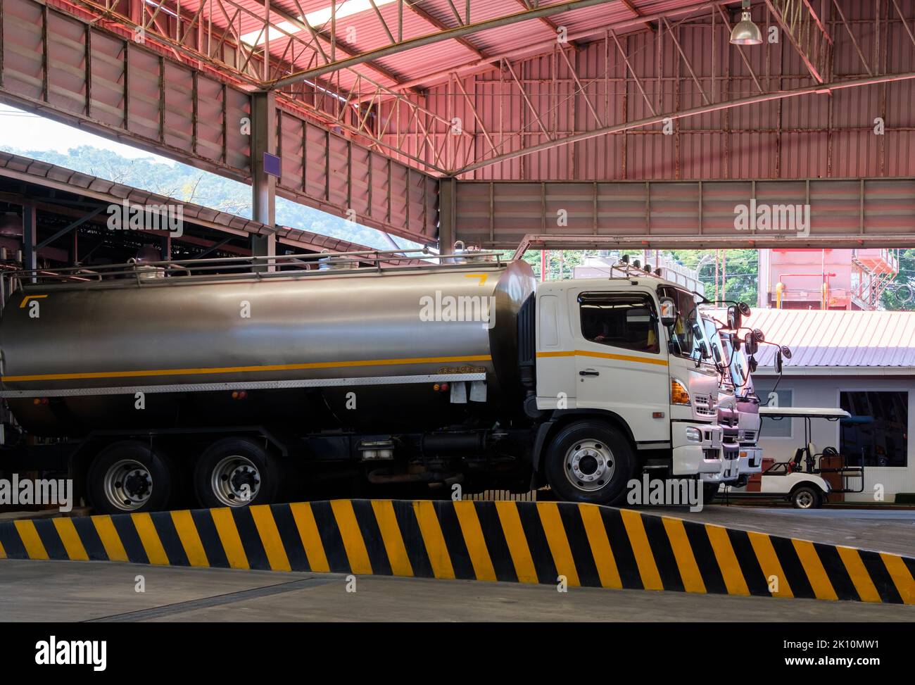 The milk tanks are loading milk into storage tanks for processing in ...