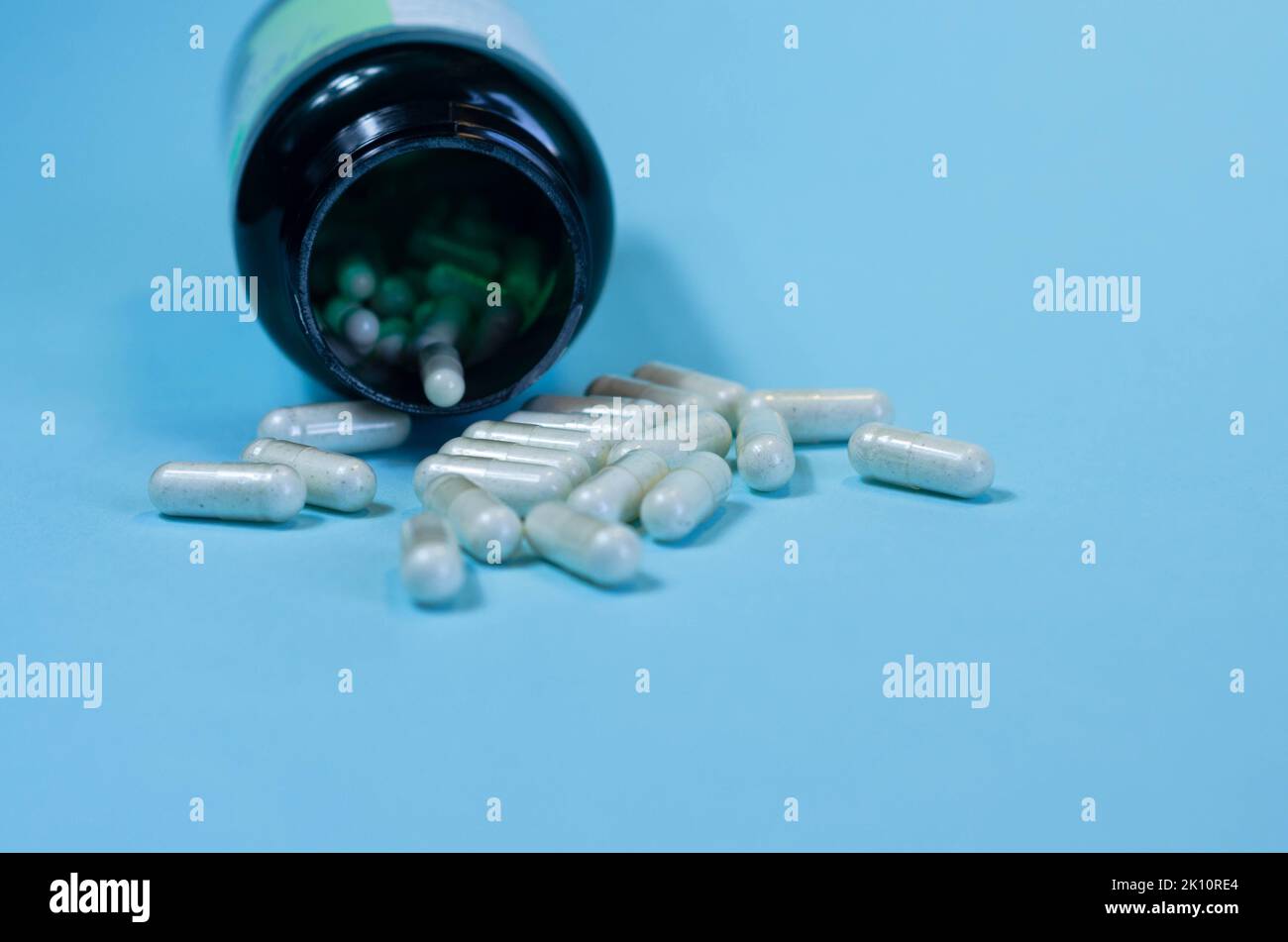 Antidepressant drugs meds, capsule and pills on blue background Stock ...