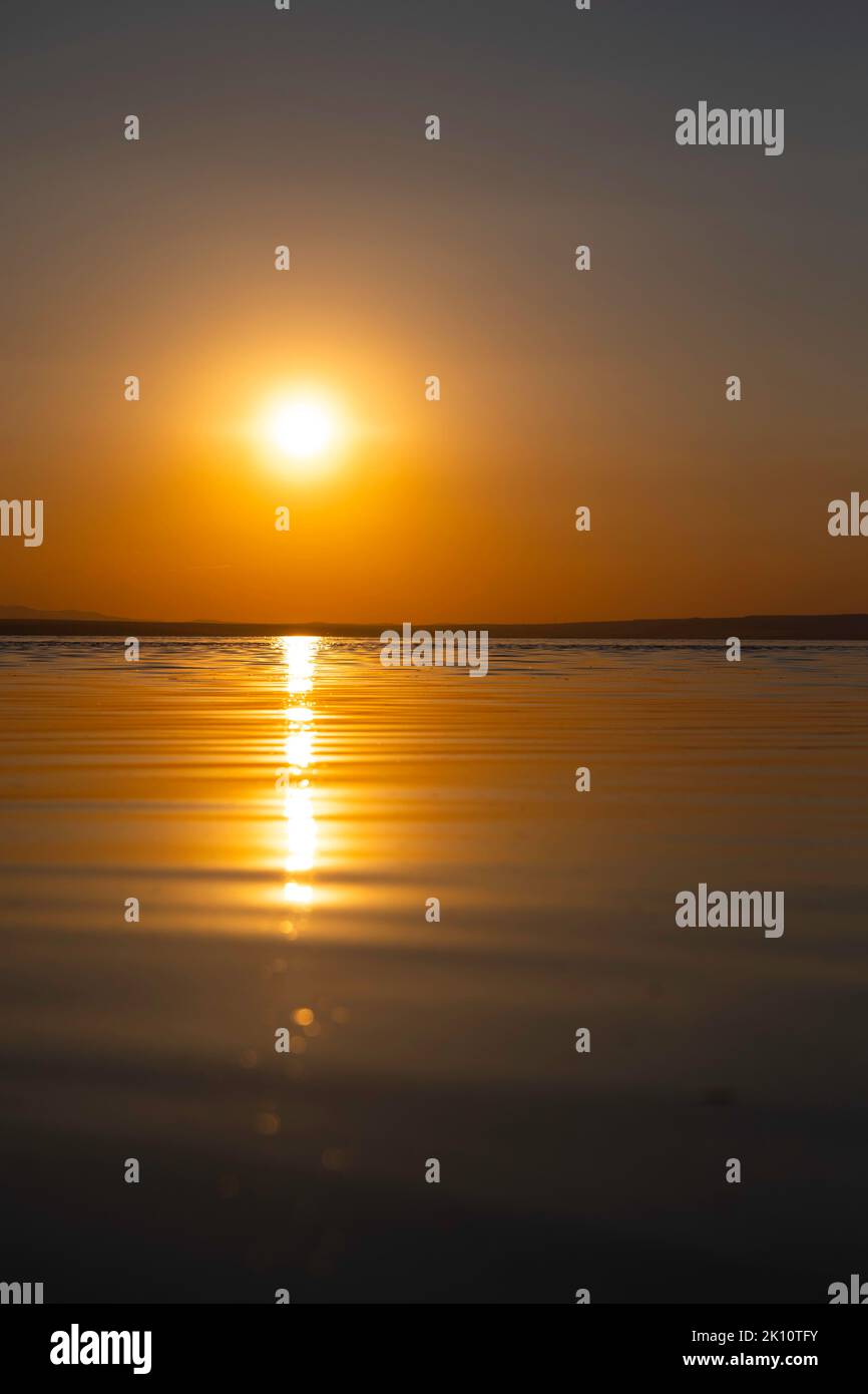 Sunset vertical story photo. Sunset over the lake in focus ...