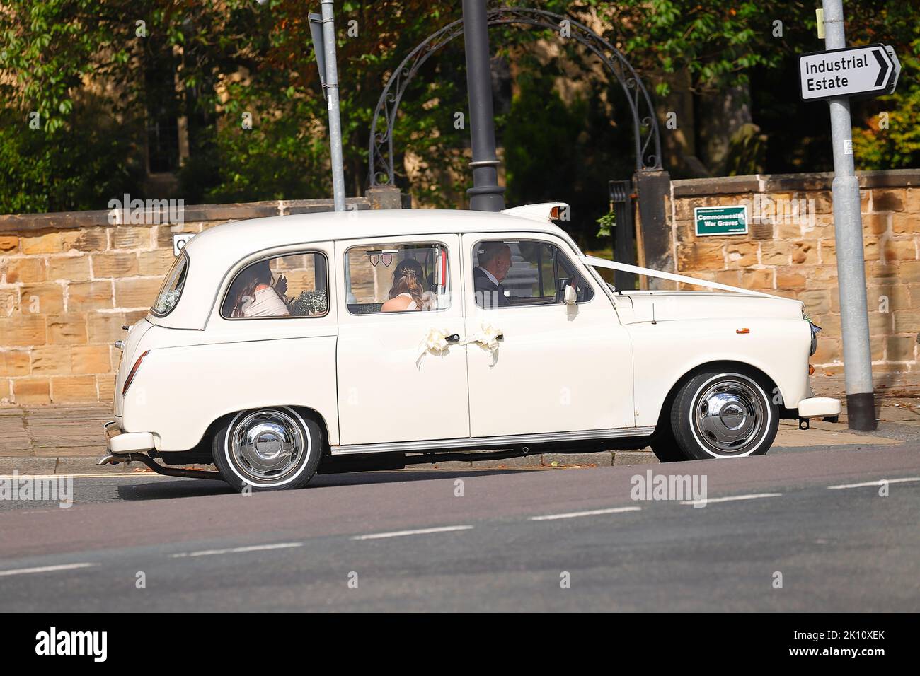 A White London Taxi Cab used for transporting guests to a wedding at St ... A White London Taxi Cab used for transporting guests to a wedding at St ...