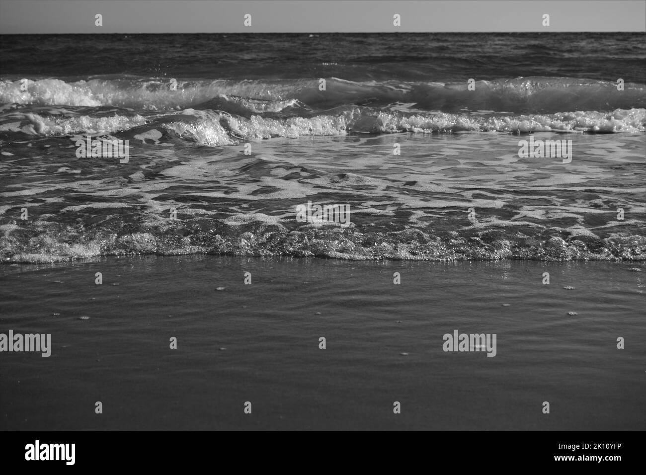 rough sea black and white at the paradise beach of the island of kos ...