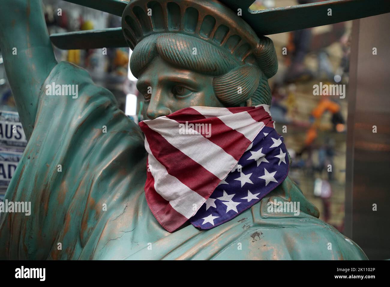 usa flag masked muzzled liberty statue new york city Stock Photo - Alamy