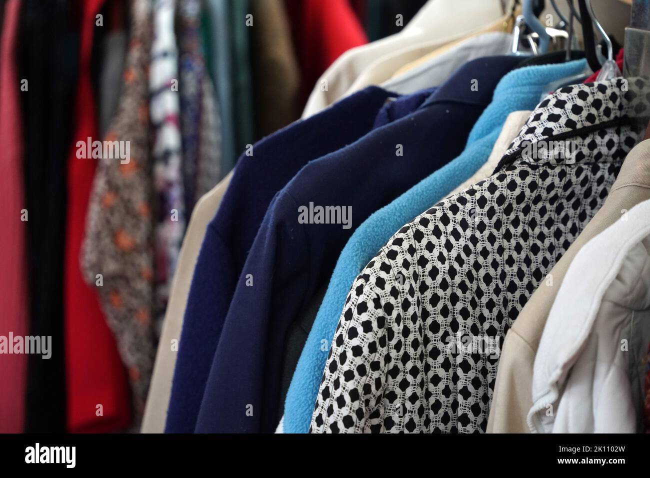 Detail of Vintage used clothes for sale inside a shop Stock Photo - Alamy