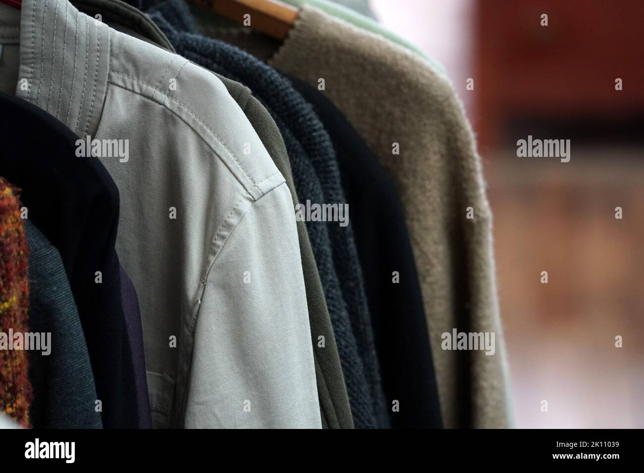 Detail of Vintage used clothes for sale inside a shop Stock Photo - Alamy