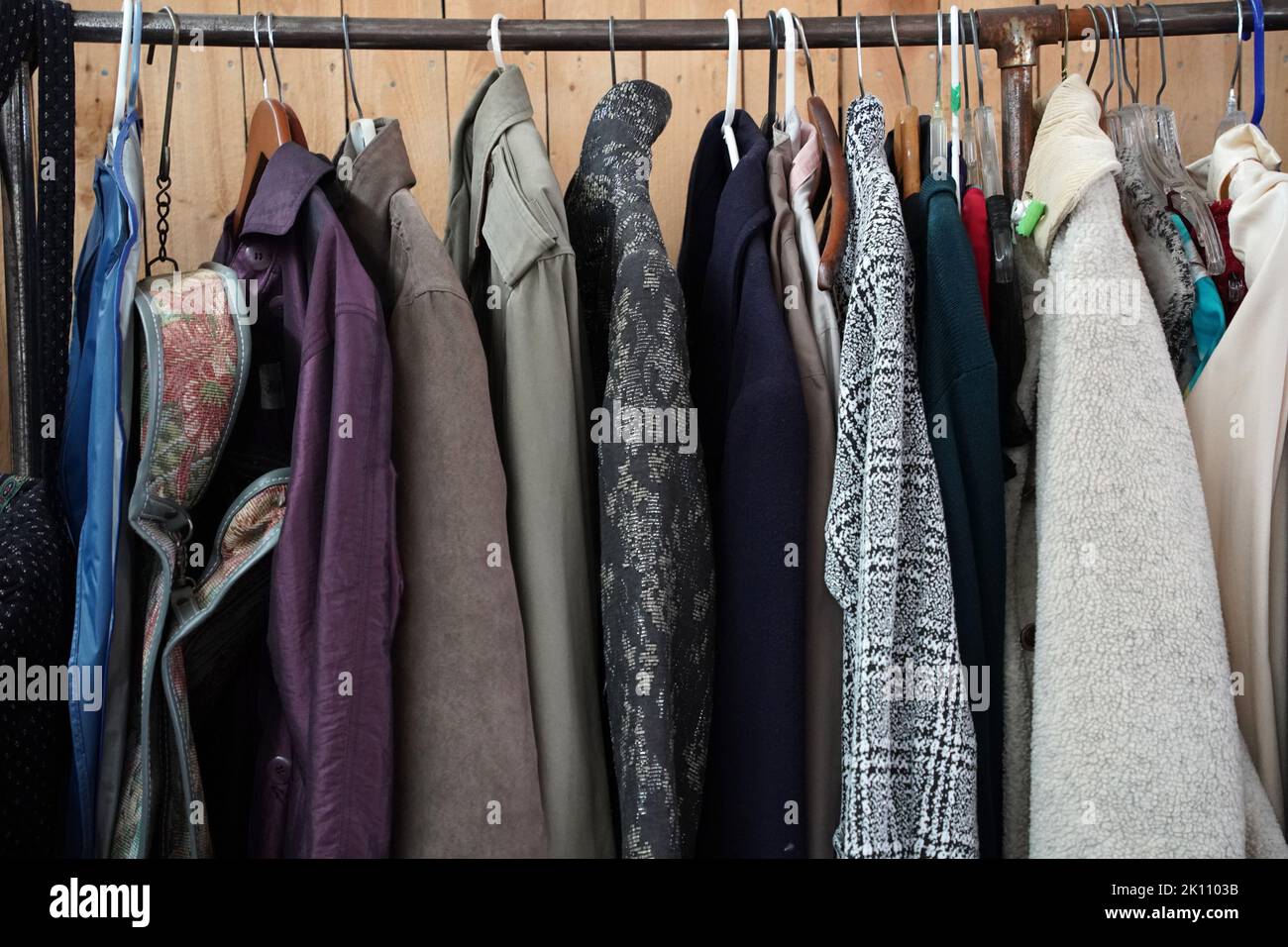Detail of Vintage used clothes for sale inside a shop Stock Photo - Alamy