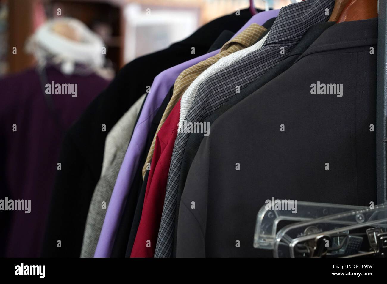 Detail of Vintage used clothes for sale inside a shop Stock Photo - Alamy
