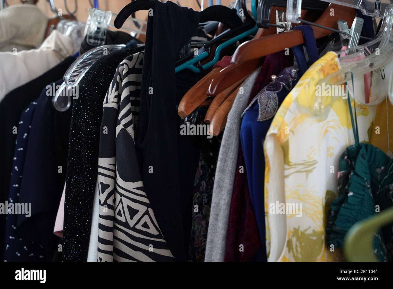 Detail of Vintage used clothes for sale inside a shop Stock Photo - Alamy