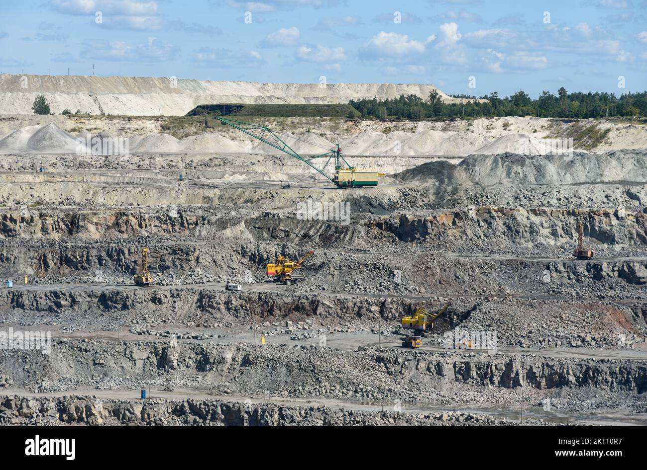 Technique works in a large mining quarry Stock Photo - Alamy