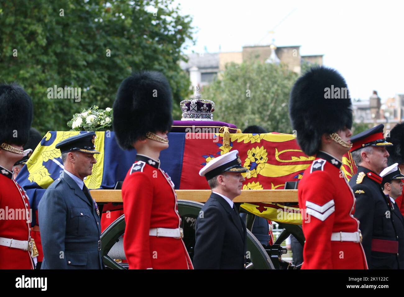 Queen Elizabeth the second is carried on a gun carriage from Buckingham ...