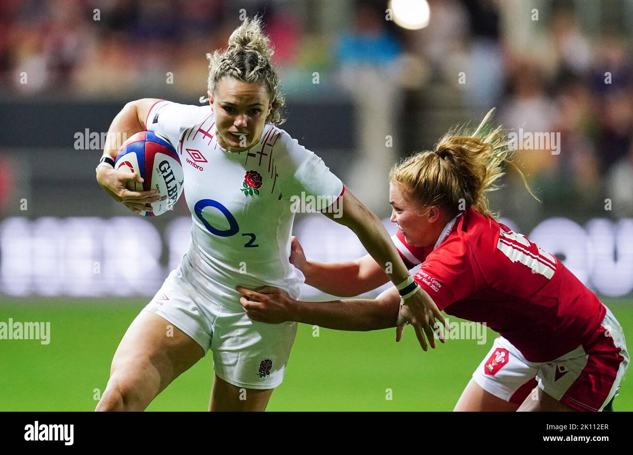 England's Ellie Kildunne is tackled by Wales’ Niamh Terry during the ...