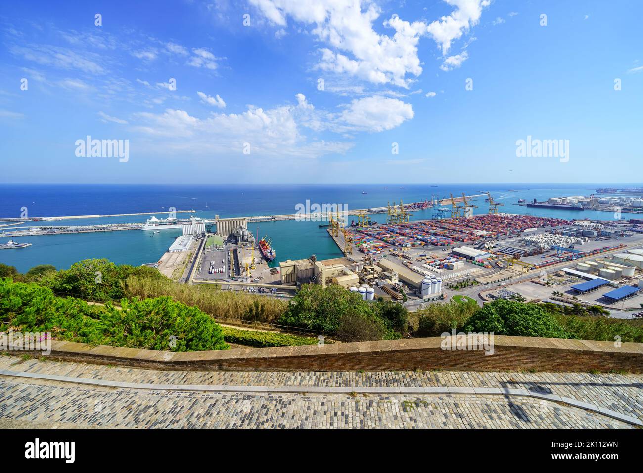 Panoramic view of the port of Barcelona with merchant ships and cargo ...