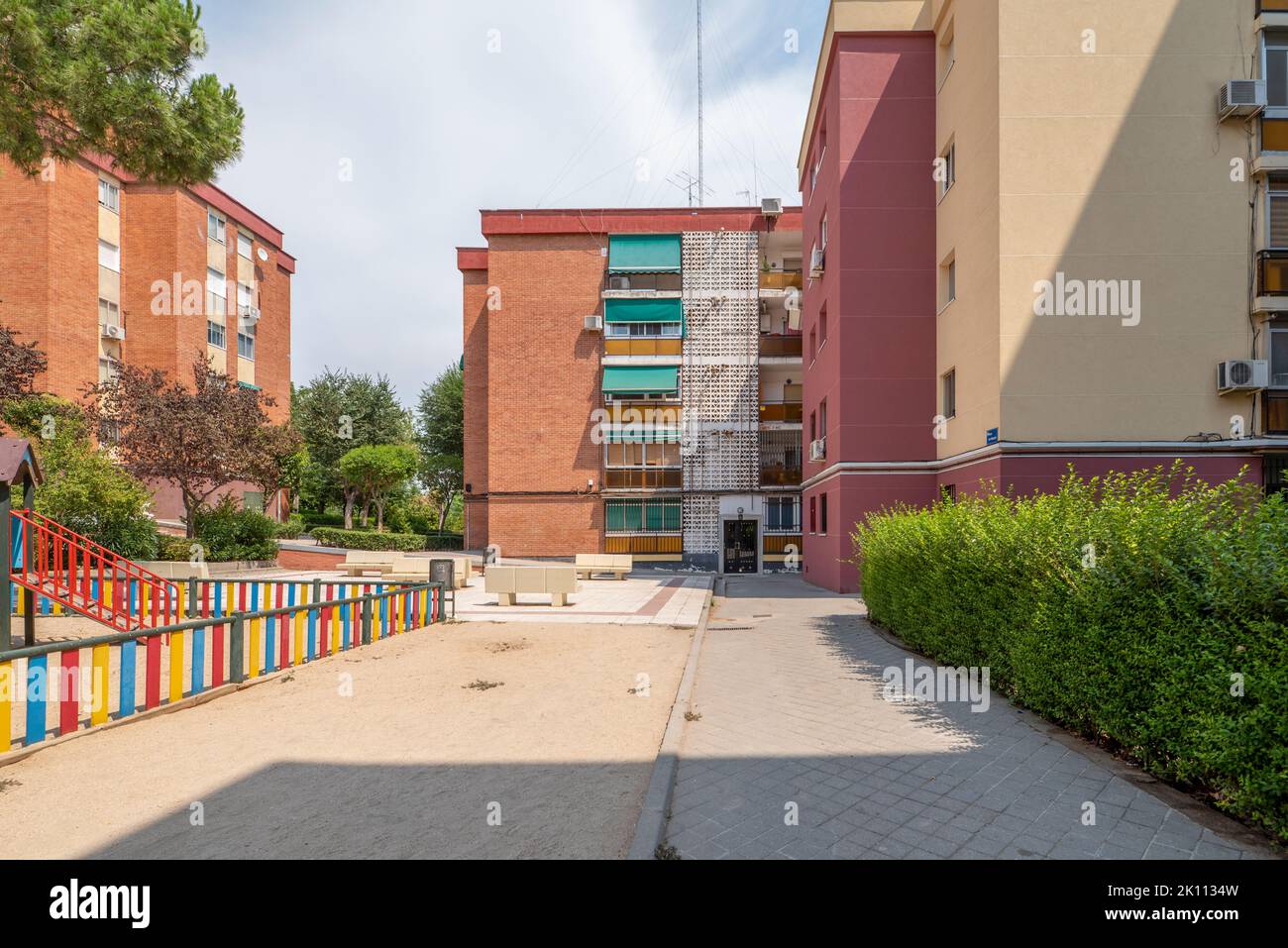 Facades of urban residential buildings with gardens in common areas ...