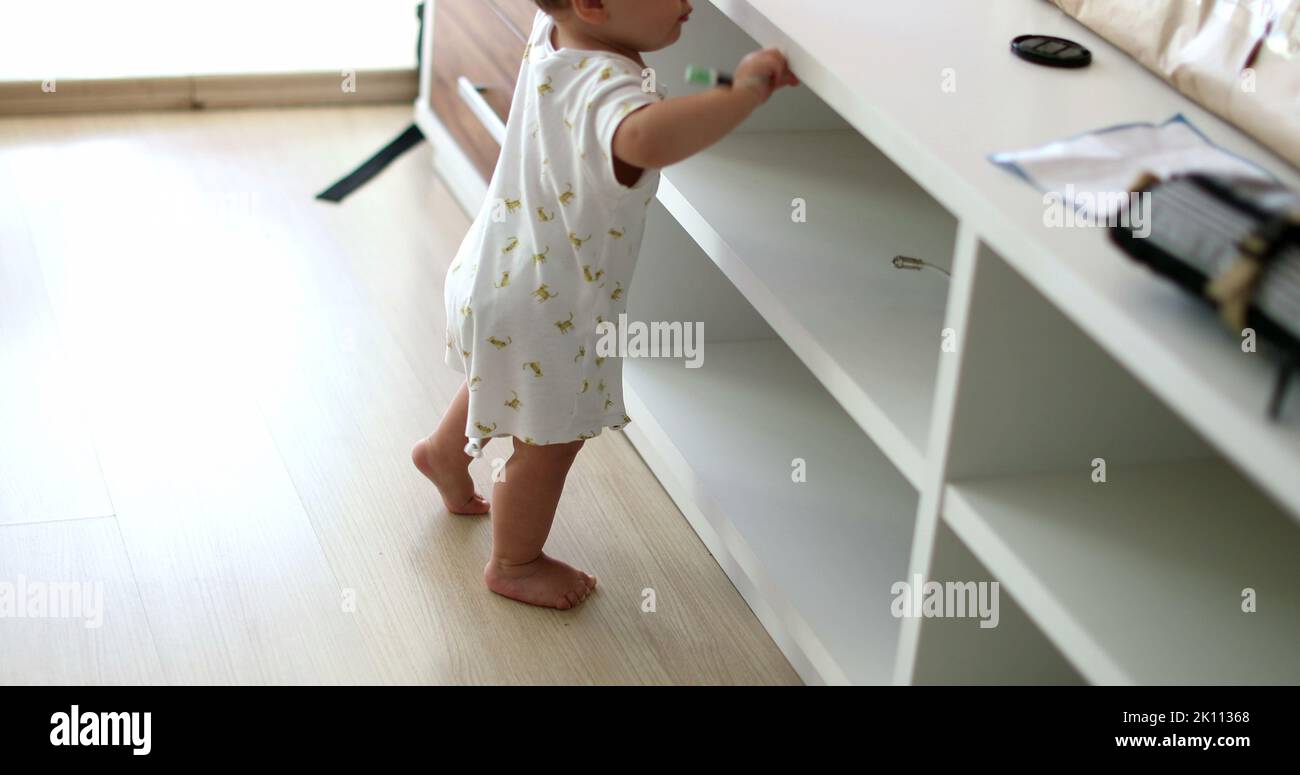 Baby learning to walk furniture hi-res stock photography and images - Alamy