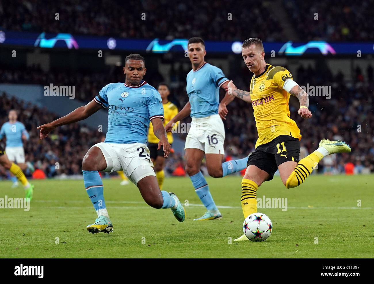 Manchester City's Manuel Akanji (left) and Borussia Dortmund's Marco ...