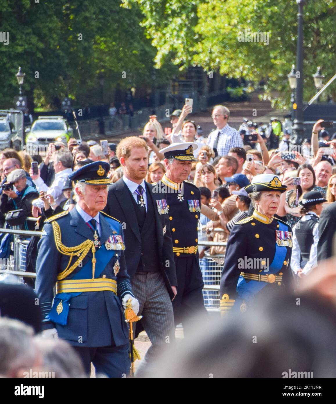 London, UK. 14th Sep, 2022. King Charles III, Prince Harry and Princess Anne walk behind the ...
