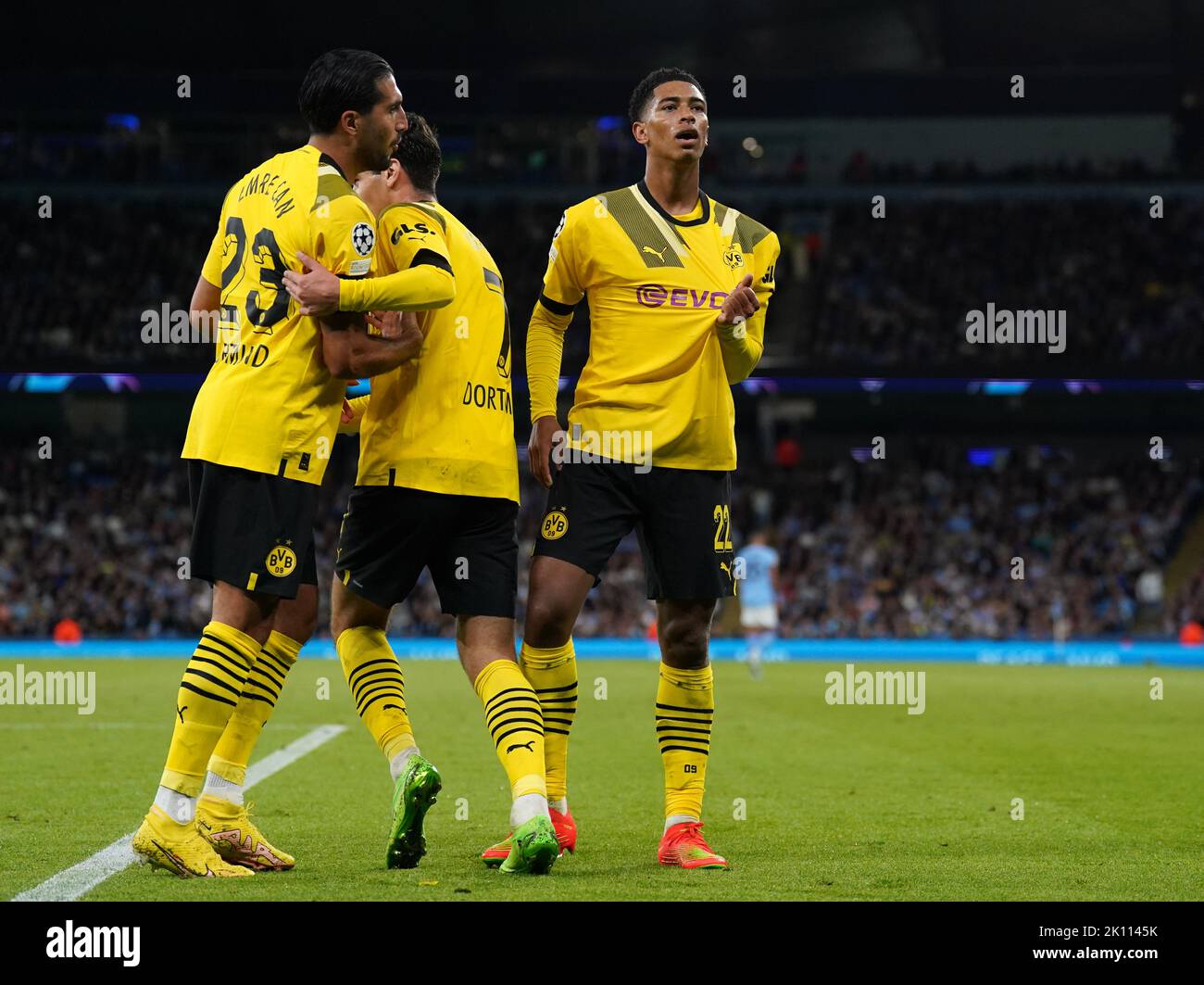 Borussia Dortmund's Jude Bellingham (right) celebrates scoring their ...
